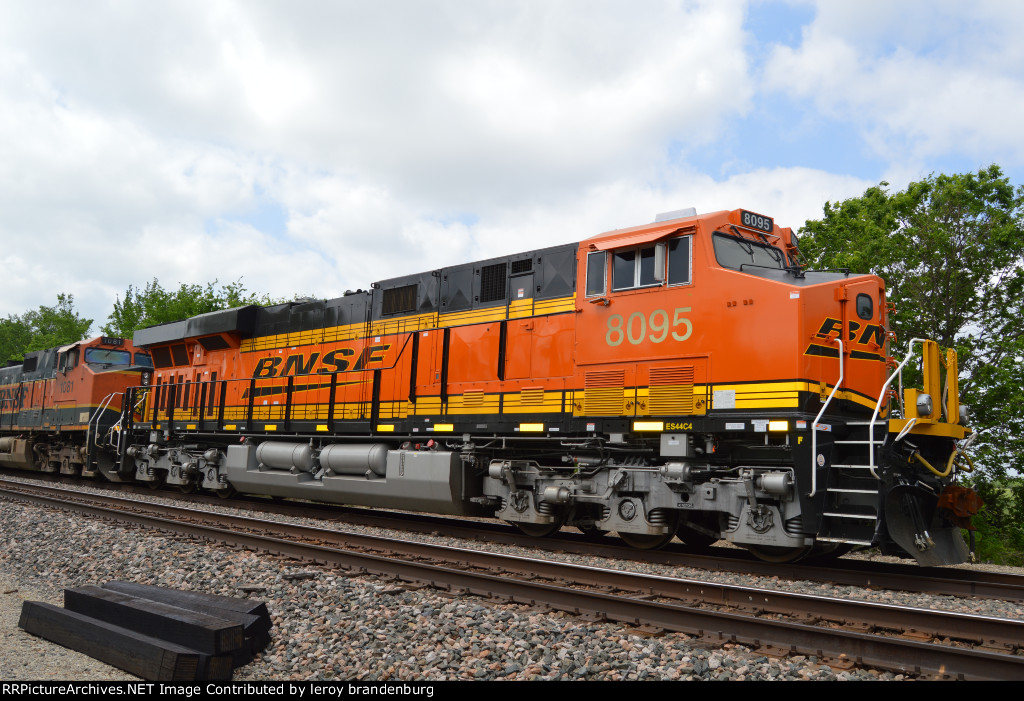 BNSF 8095 lead lead unit on the TULKCK, with 11 engines , tied down in the siding